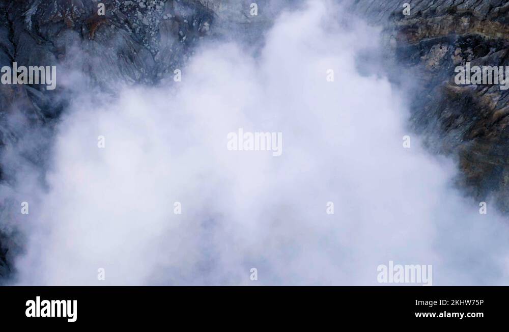 Crater of Ijen volcano, Java, Indonesia. Landscape with the green lake ...