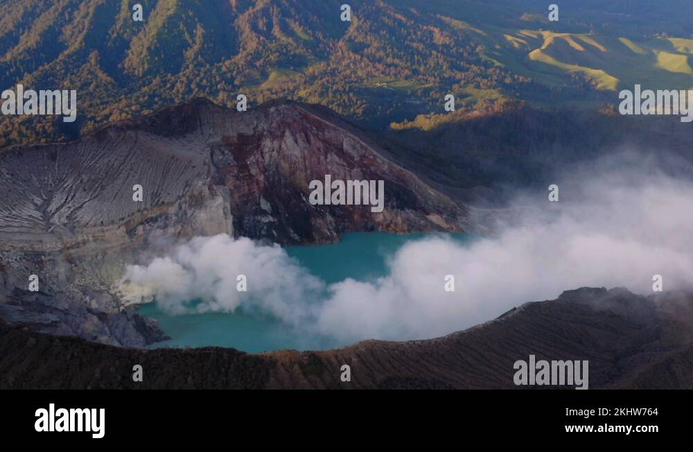 Crater of Ijen volcano, Java, Indonesia. Landscape with the green lake ...