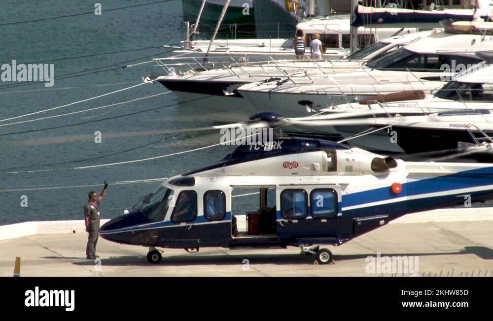 AgustaWestland AW139 Turkish helicopter stands on platform with running ...
