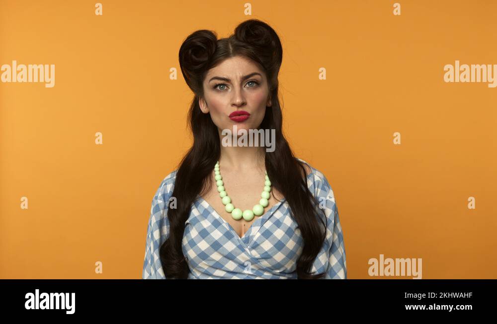 Front view of disgusted pin up woman screaming and showing no gesture ...
