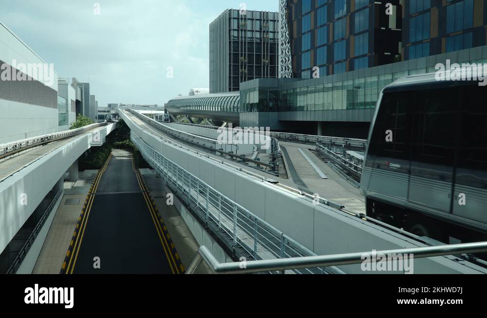 Railway bridge with skytrain in Changi International Airport Stock ...