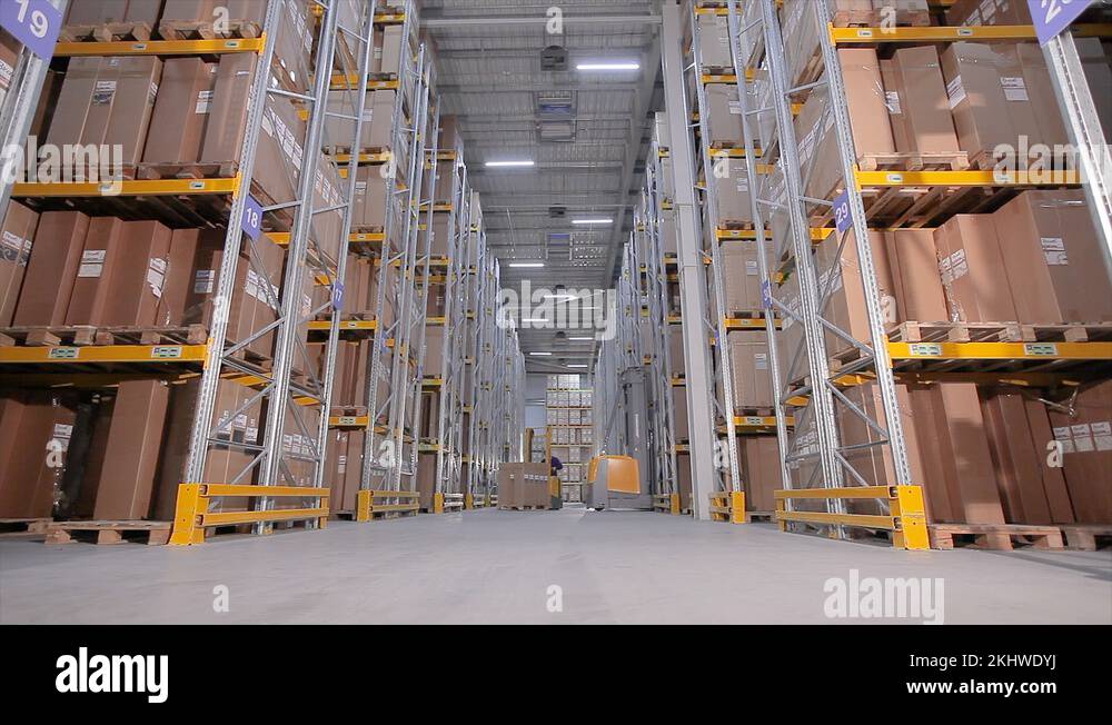 Large machine in warehouse, modern forklift in warehouse, workflow in ...