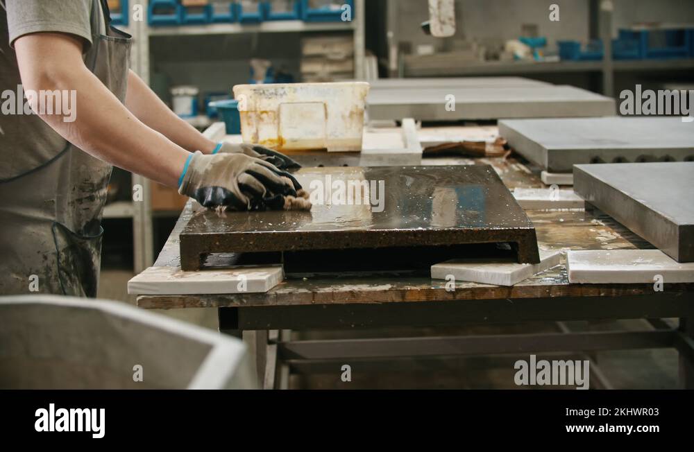 A man worker washing a concrete slab Stock Video Footage - Alamy