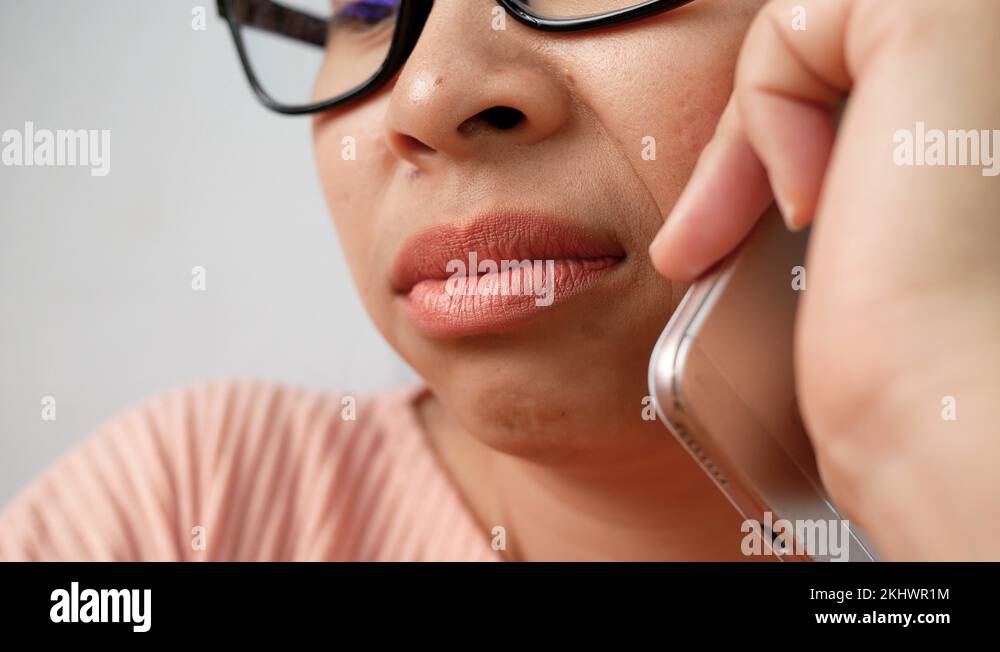 Close up of female lip without makeup speaking with disgusting on ...