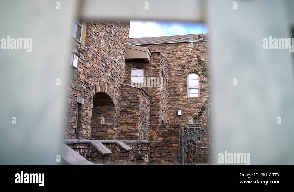 Looking Through Fence of Old Castle or Mansion with Brick and Stone ...