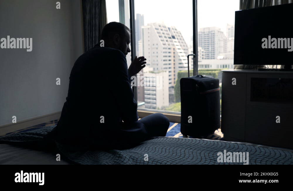 Man hotel room sad Stock Videos & Footage - HD and 4K Video Clips - Alamy