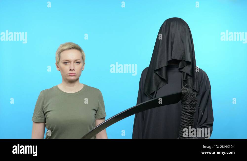 scene. blue background. the woman shows the syringe of death goes Stock ...