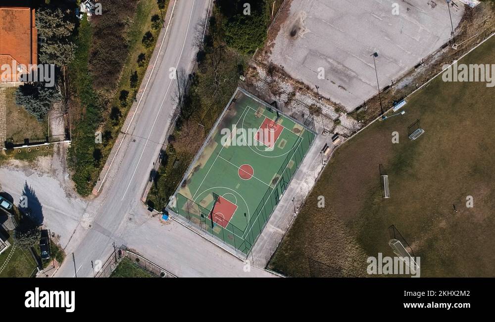 Rotating overhead aerial clip over a basketball court in a sports ...