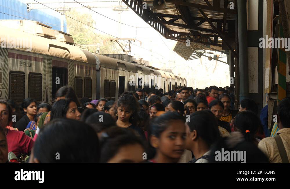 Crowd at extremely busy railway platform. Mumbai, India Stock Video ...