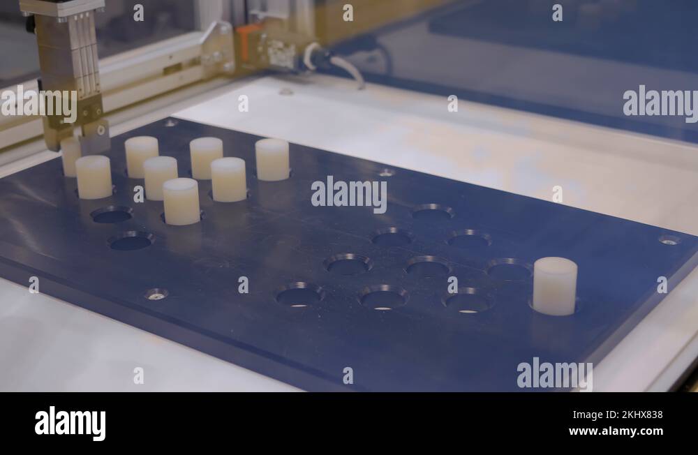 Automated robotic clamp arm, robot hand during work at exhibition ...