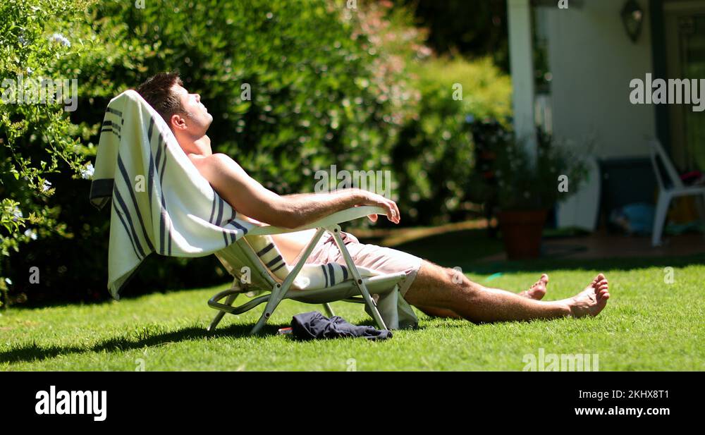 Backyard sunbathing Stock Videos & Footage - HD and 4K Video Clips - Alamy