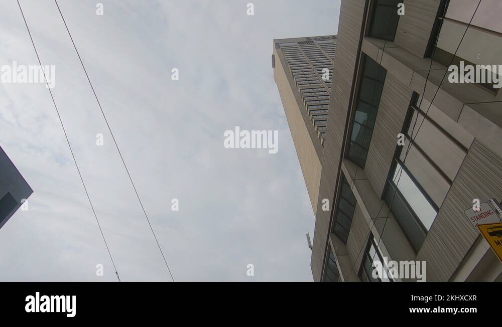 POV tilt up office towers buildings and financial district in Toronto ...