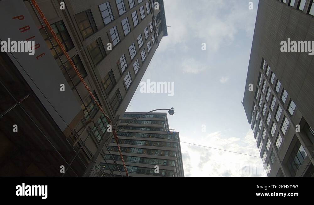 POV tilt up office towers buildings and financial district in Toronto ...