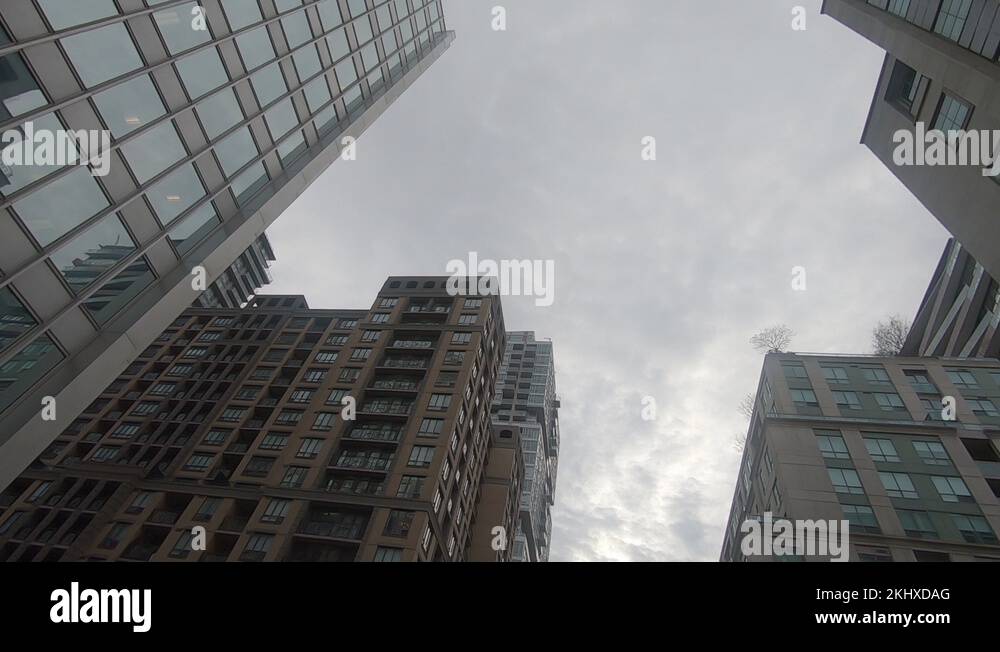 POV tilt up office towers buildings and financial district in Toronto ...