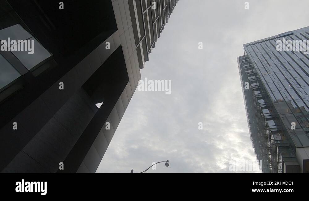 POV tilt up office towers buildings and financial district in Toronto ...