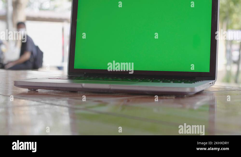 4K Green screen of laptop computer set on working space Stock Video ...