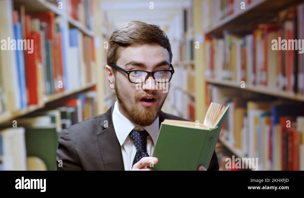 Smart handsome man reading book Stock Videos & Footage - HD and 4K ...