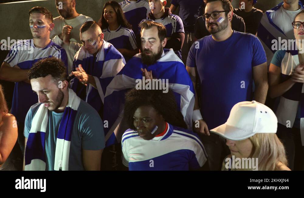 4K: Football & Soccer fans in crowd celebrating a goal being scored in ...