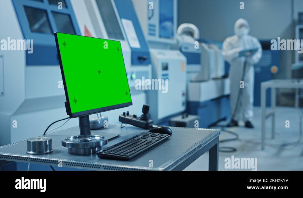 Factory Cleanroom: On the Desk Personal Computer Showing Green Screen ...