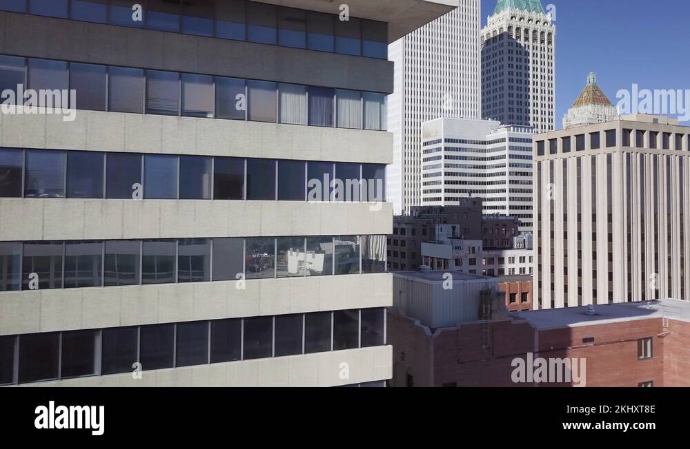 Flying through buildings in downtown Tulsa city streets Stock Video ...
