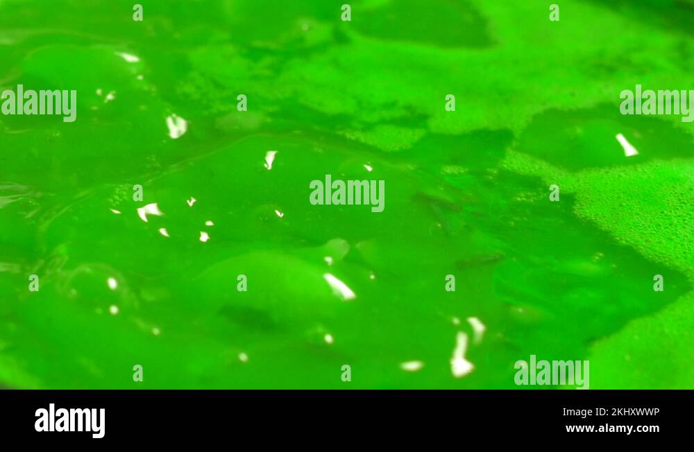 Green liquid boils. Toxic chemical substance. Witch's potion Stock ...