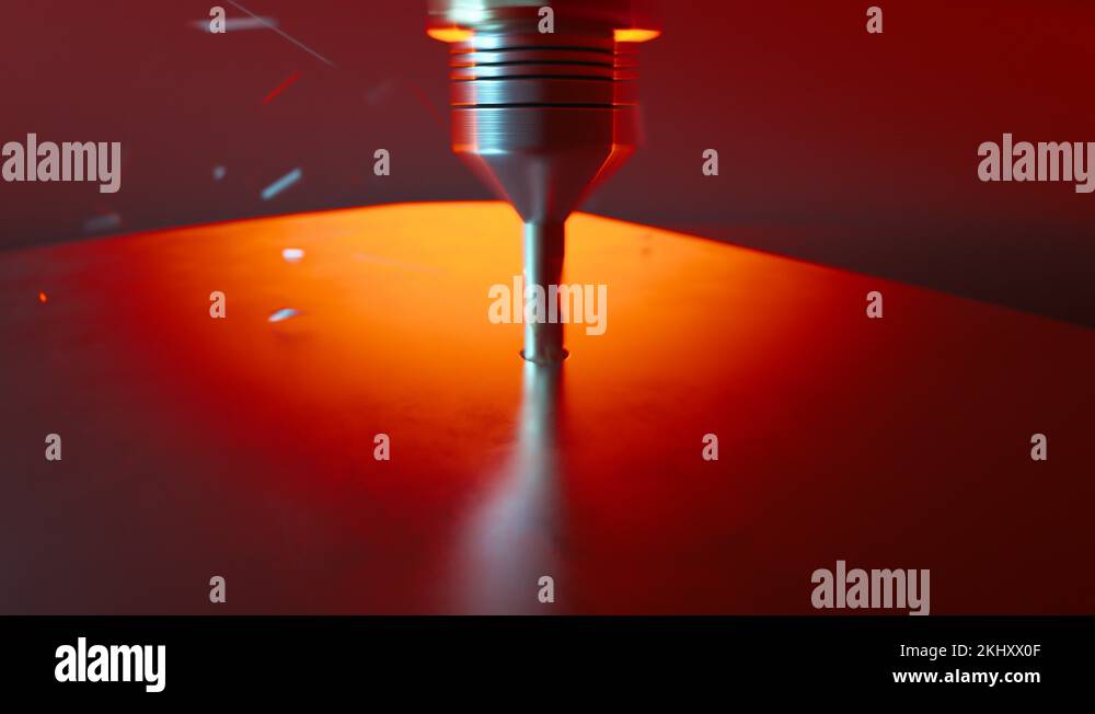 Advanced industrial CNC machine milling complex hole in a metal part ...