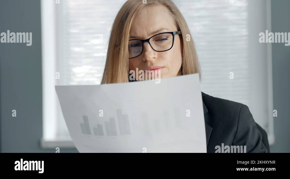 Woman carefully reading document Stock Videos & Footage - HD and 4K ...