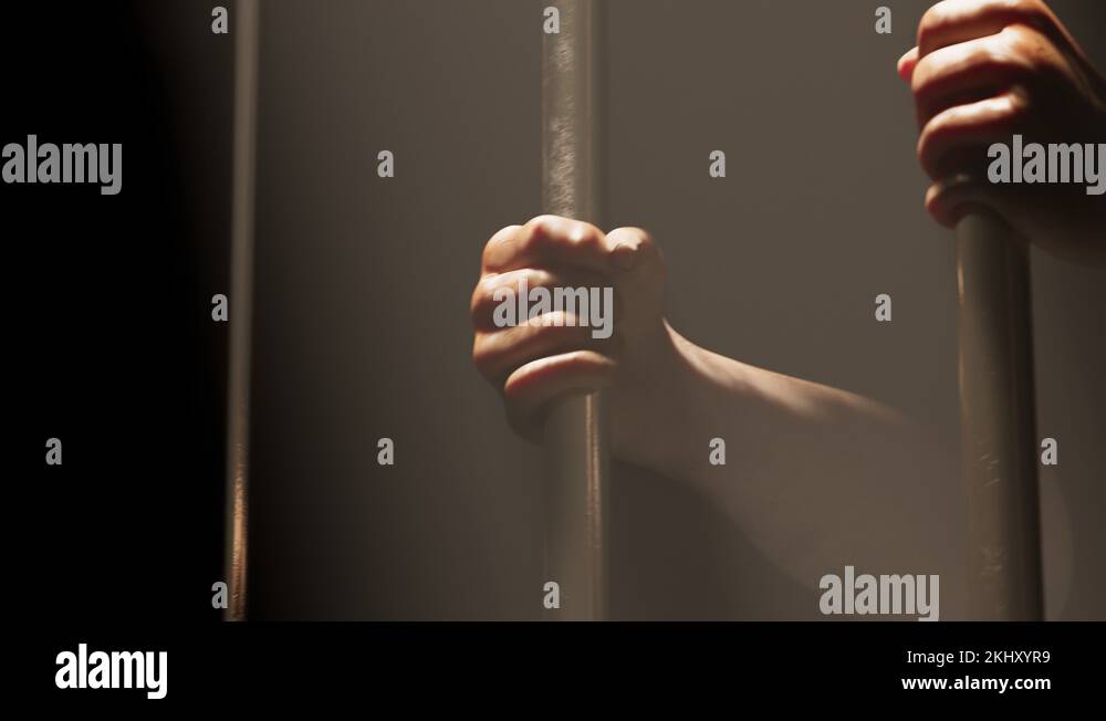 Prison cell bars prisoners hands Stock Videos & Footage - HD and 4K ...