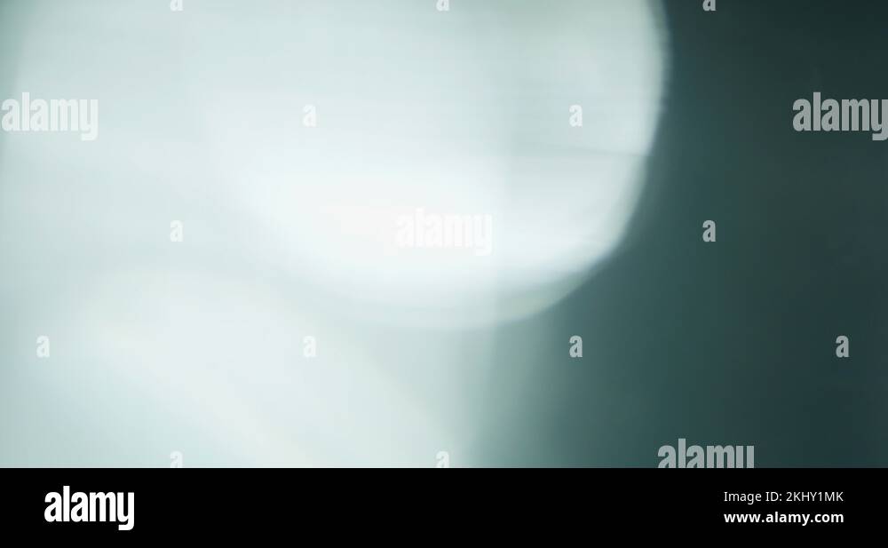 Slow motion real lens flare through glass effects for overlay or ...