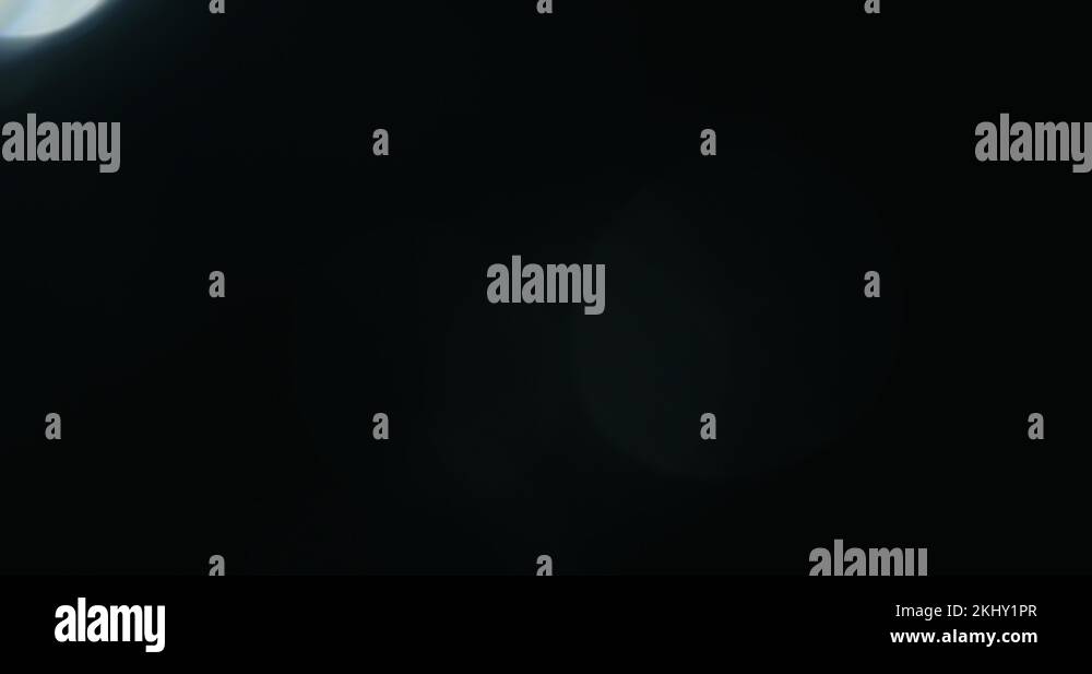 Slow motion real lens flare through glass effects for overlay or ...