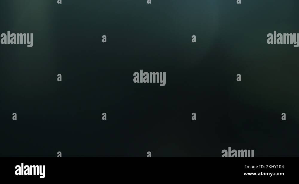 Slow motion real lens flare through glass effects for overlay or ...