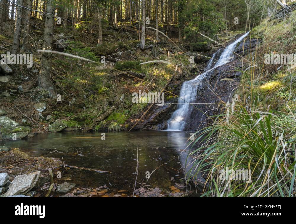 8K Autumn waterfall and spinning leaves in pond Stock Video Footage - Alamy