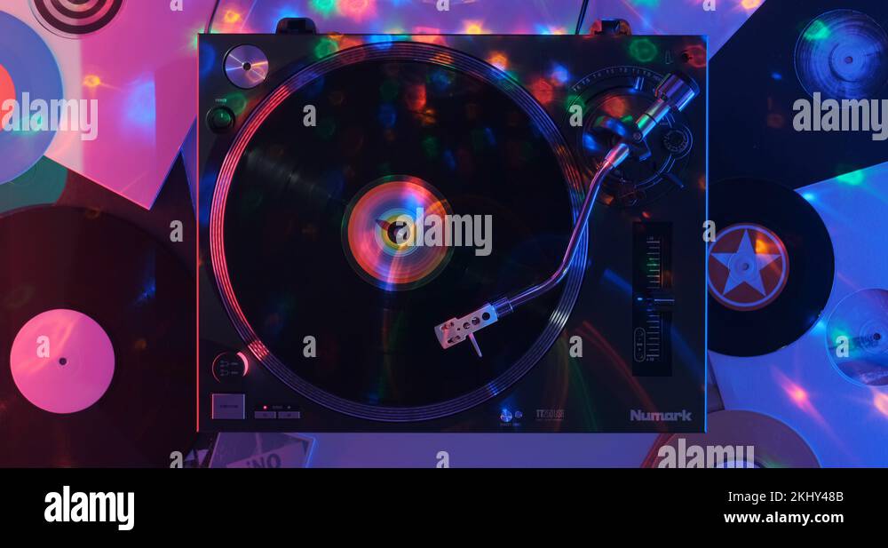 DJ player turntable black vinyl color spectrum label red blue neon ...