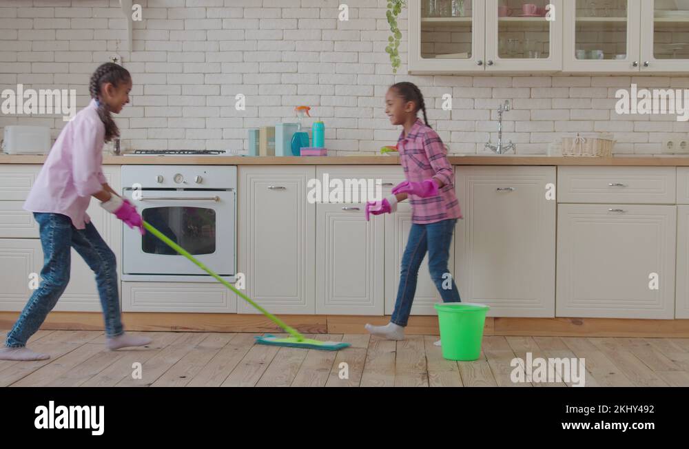 Sweeping mopping floor kitchen Stock Videos & Footage - HD and 4K Video ...