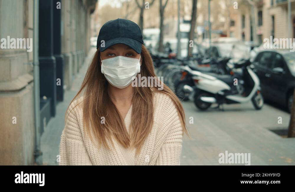 Virus mask spanish woman on street wearing face protection in ...