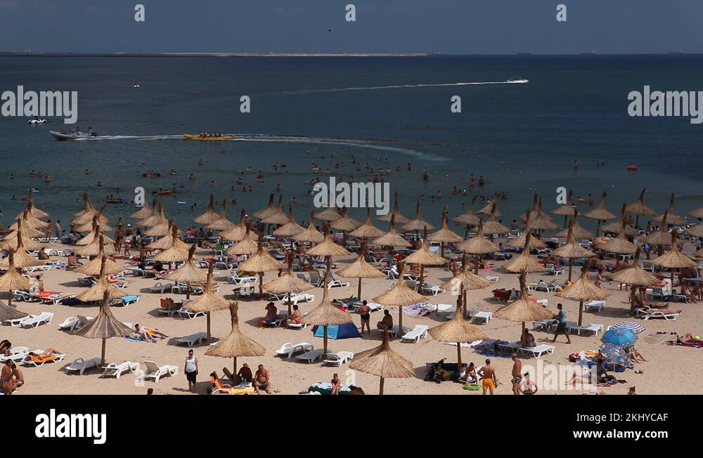 People at the beach, tourists population, sea, sunbathing, crowd ...
