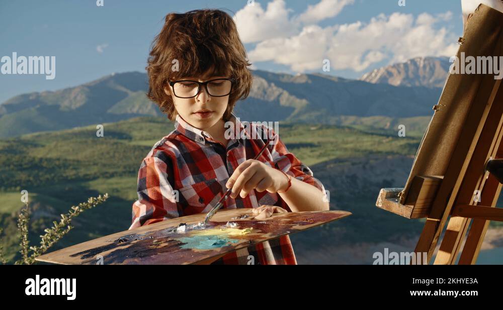 Young kid learning how to draw by creating a picture, inspired by ...