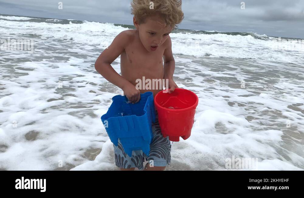 Carrying buckets Stock Videos & Footage - HD and 4K Video Clips - Alamy