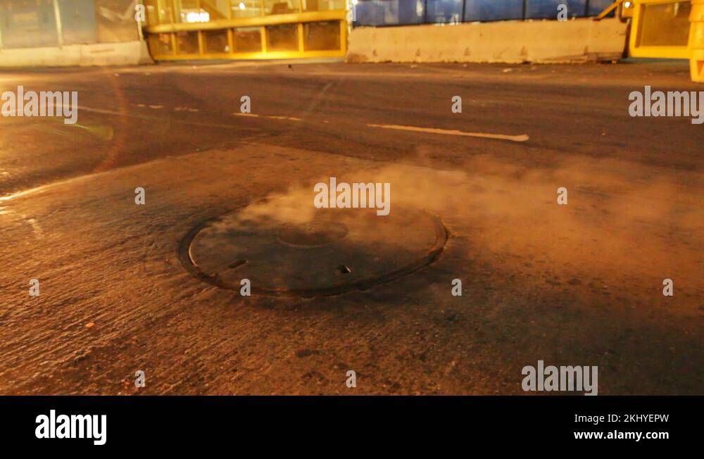 A manhole cover Stock Videos & Footage - HD and 4K Video Clips - Alamy