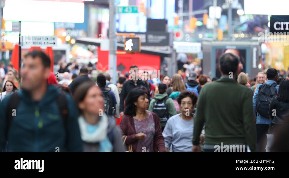 Urban Crowd of commuters, unrecognizable tourists in Manhattan, NYC ...