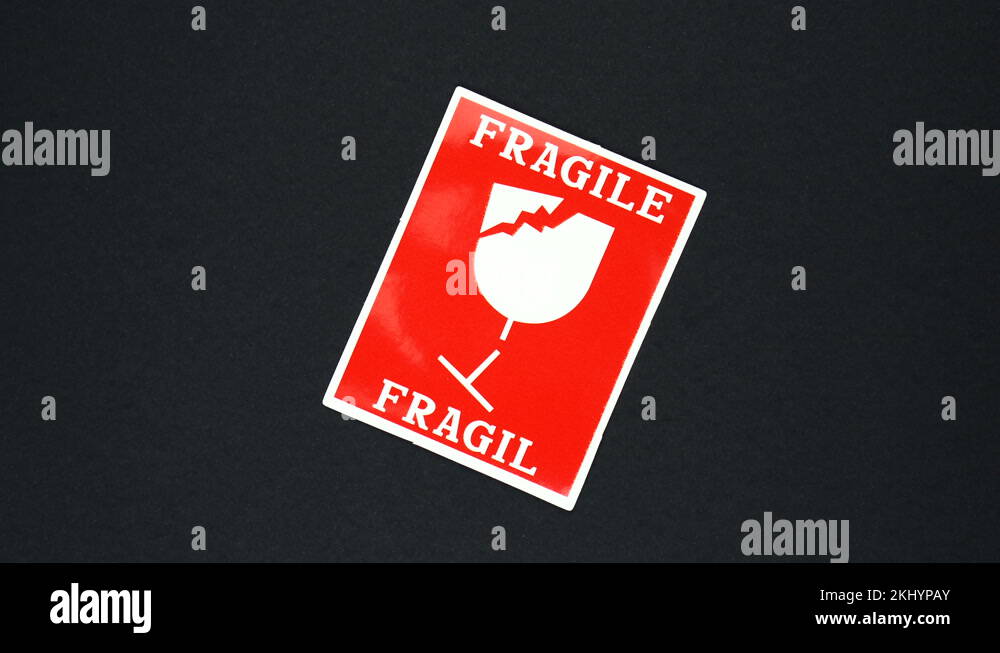 FRAGILE warning sign word text Stock Video Footage - Alamy