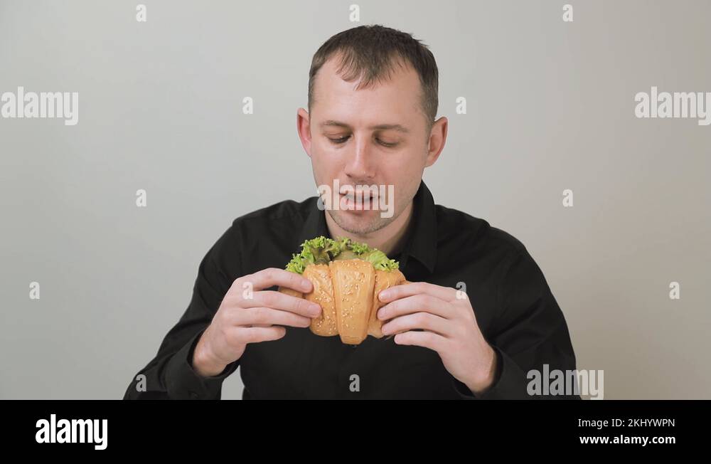 Man eating sausage roll Stock Videos & Footage - HD and 4K Video Clips ...