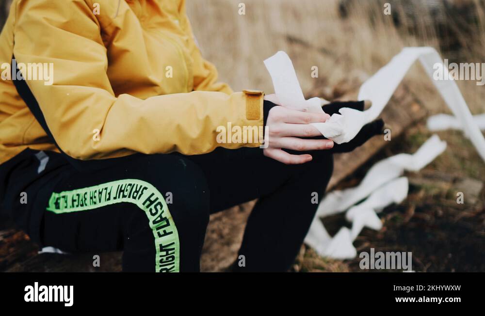 Sad guy sitting alone in a vacant lot. Outskirts of town. Emotions and ...