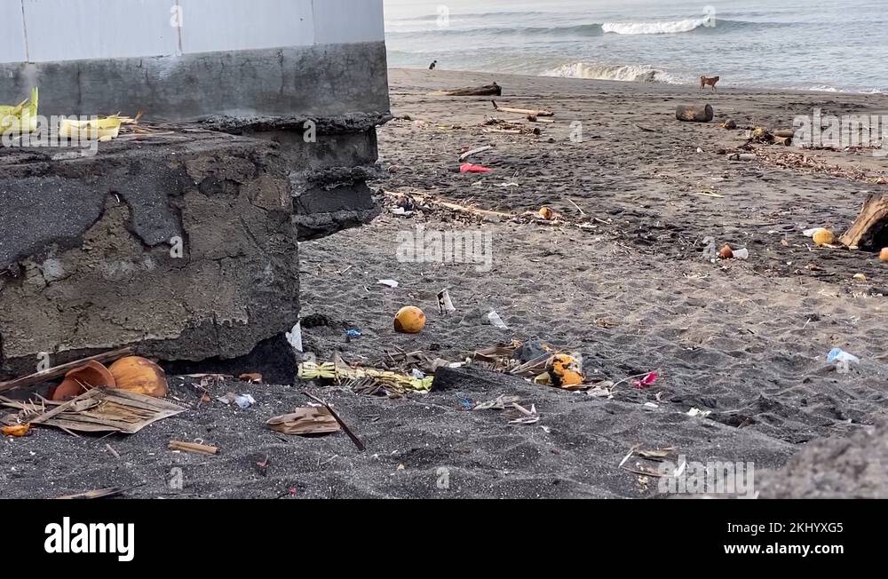 litter, plastics and pollution at the beach in Bali. Slow moving ...