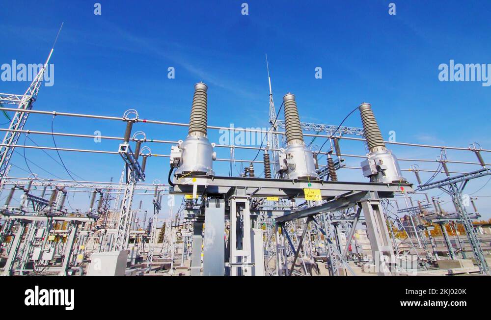 insulators and cables at electrical transmission substation Stock Video ...