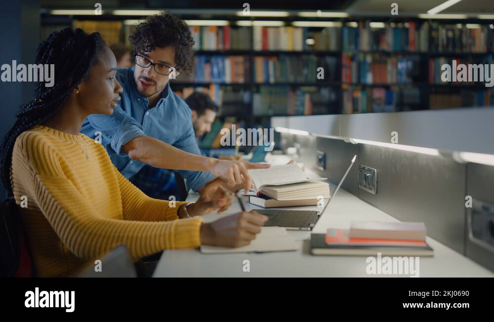 University Library: Gifted Black Girl uses Laptop, Smart Classmate ...