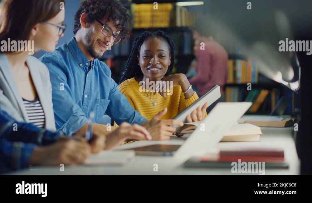 Students group discussion library Stock Videos & Footage - HD and 4K ...