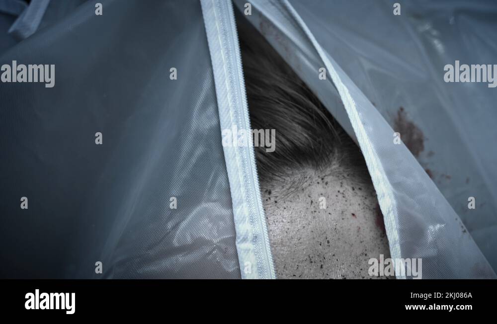 4k Dead Human Body Cadaver Laying Killed in Bag Stock Video Footage - Alamy