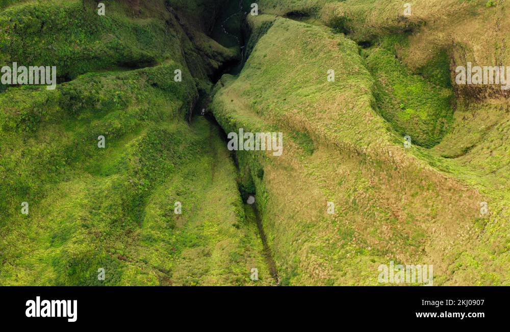 Rocky ridges and deep gorges of peculiar hawaiian terrain. Aerial ...