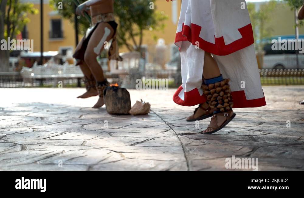 Closeup slow motion of angle jangles worn by Mayan and Aztec dancers in ...
